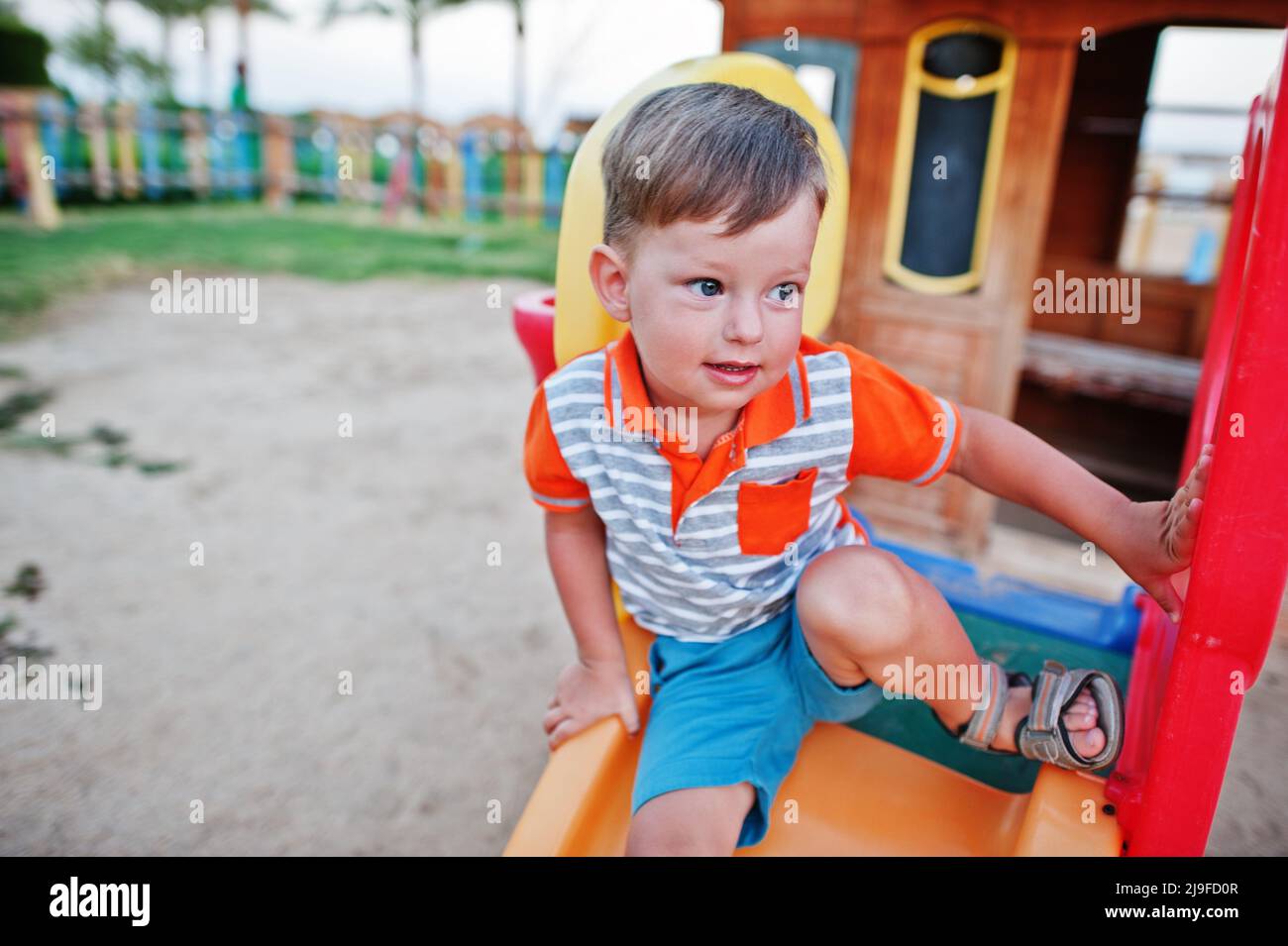 Boy at playground of egyptian resort Stock Photo - Alamy