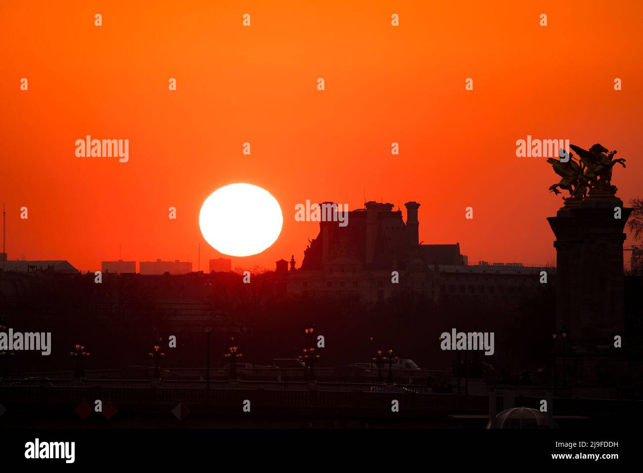 View of the famous Louvre Museum during the sunrise in Paris France ...
