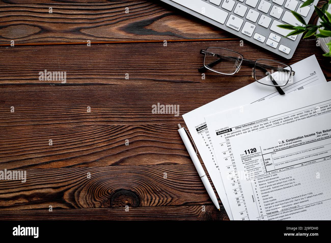 US tax form on office table desktop. Accountant culculate taxes Stock ...