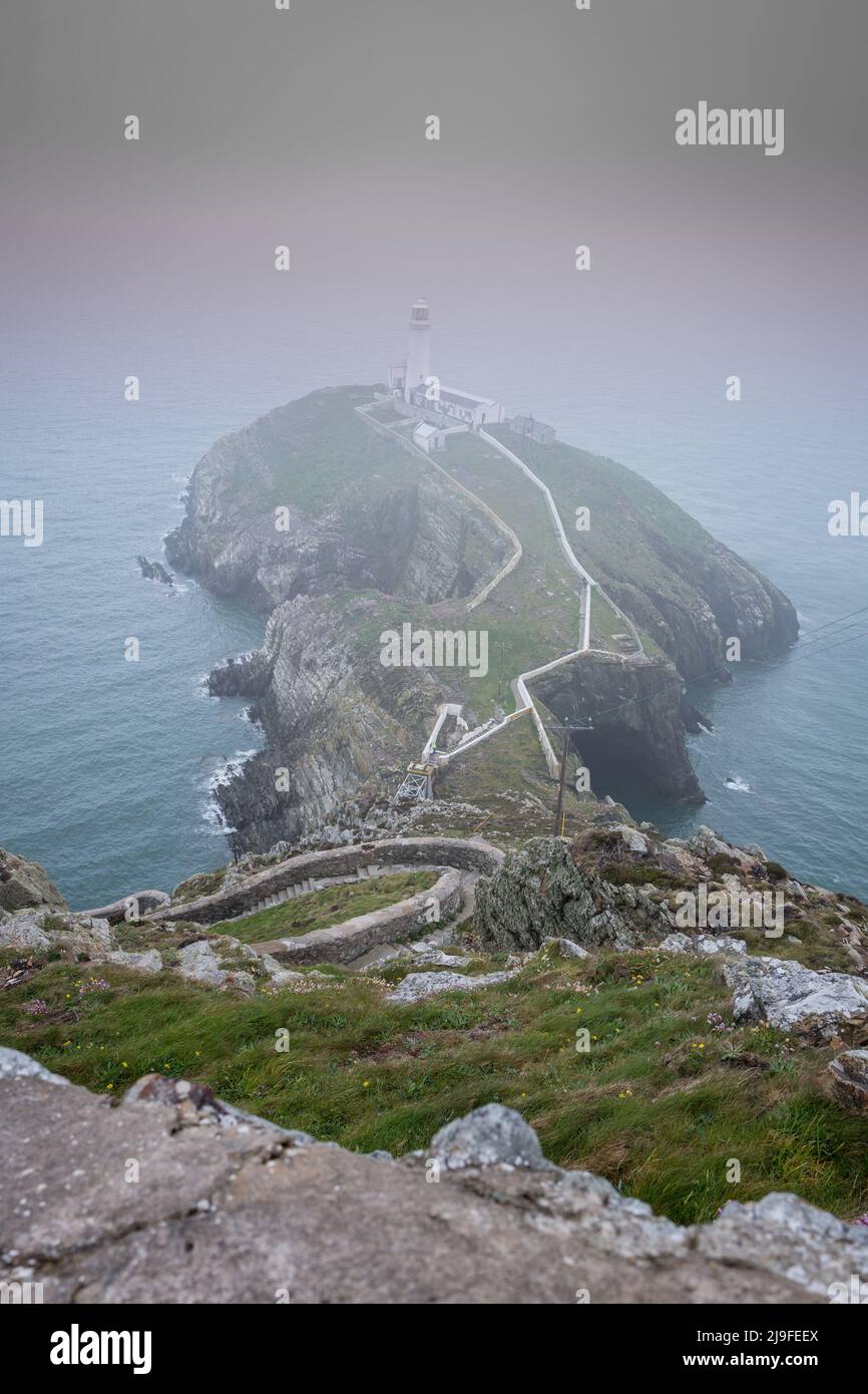 South Stack Lighthouse, Holy Island, Anglesey, Wales, on a cold, windy ...