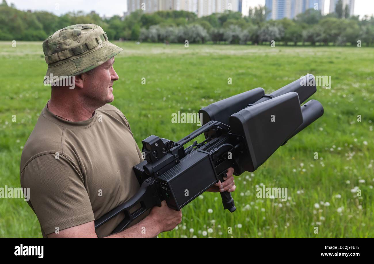 Kyiv, Ukraine. 14th May, 2022. A Ukrainian soldier demonstrates work of ...
