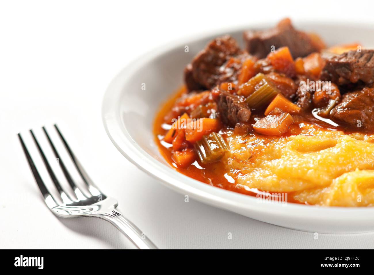 Beef goulash with polenta hi-res stock photography and images - Alamy