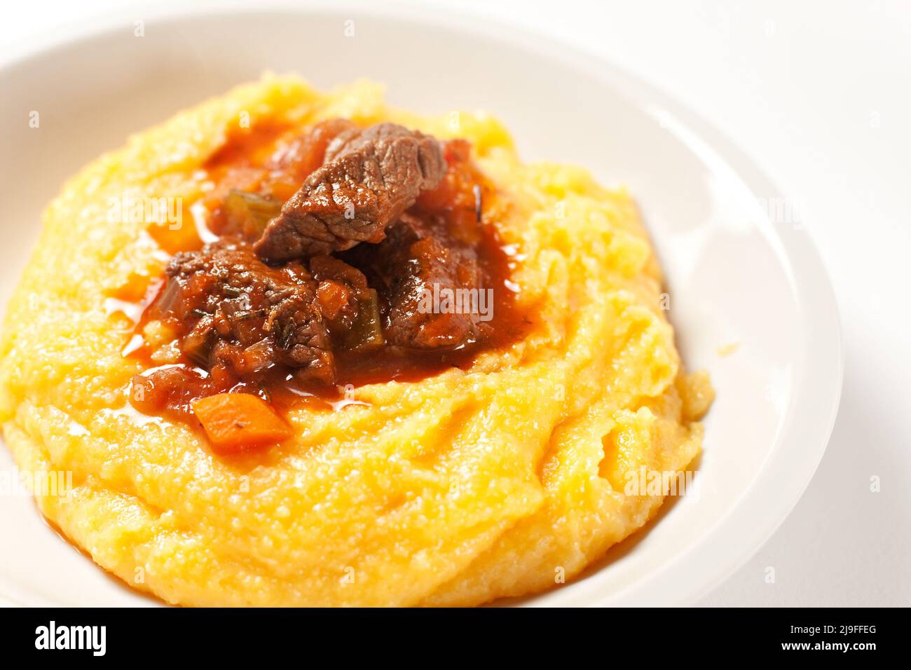 Beef goulash with polenta hi-res stock photography and images - Alamy
