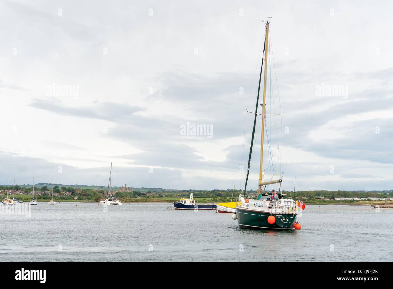 Boats at the harbour of the small fishing town of Amble, Northumberland ...