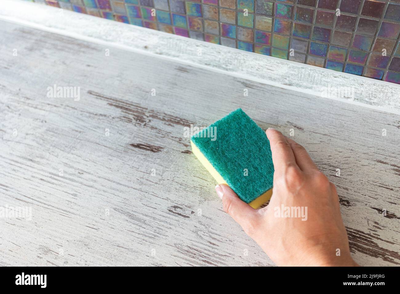 Cleaning sponge in woman's hands. cleaning service. order in the house ...