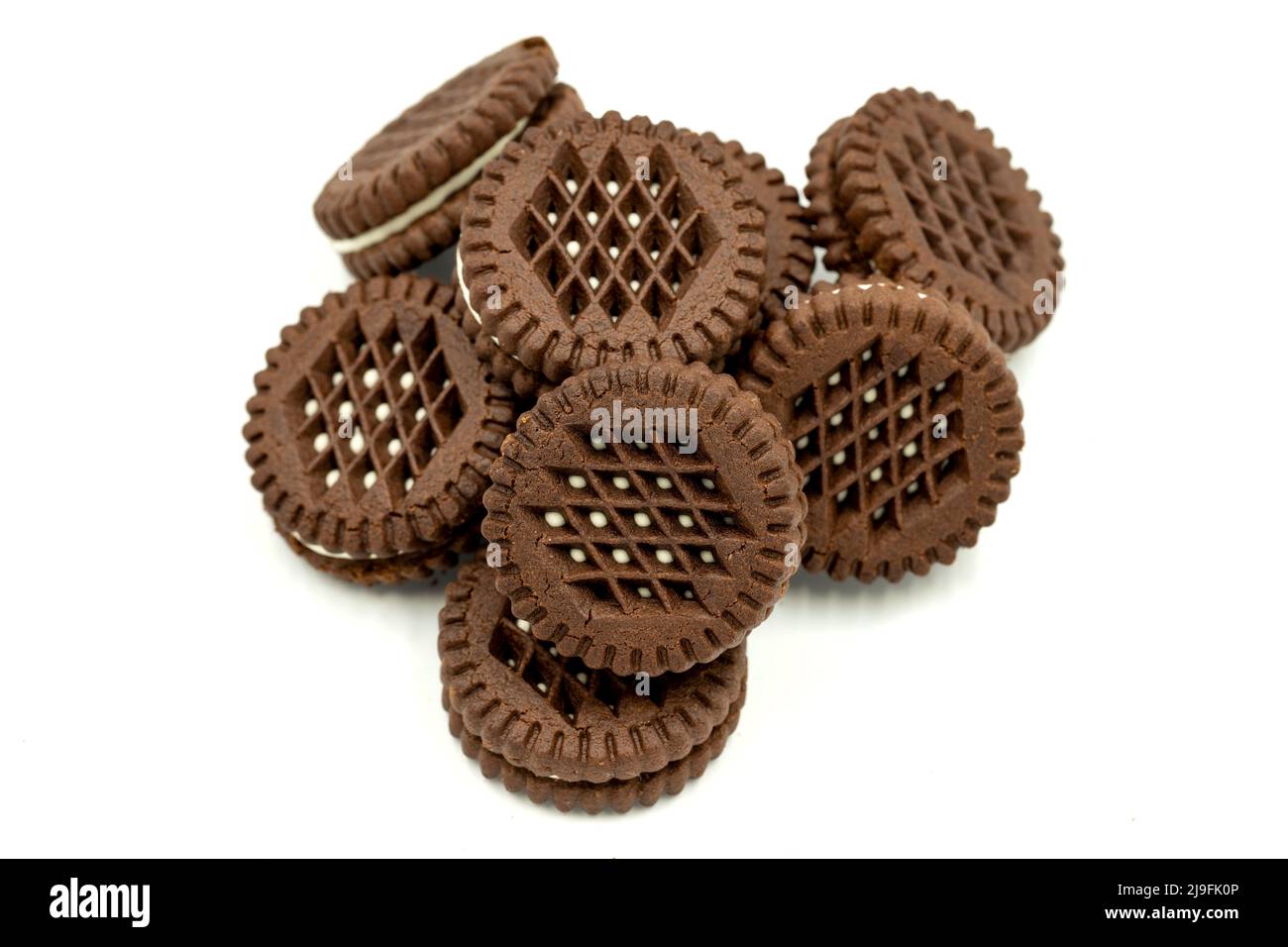 Cocoa biscuits with cream filling on a white background. close up Stock ...