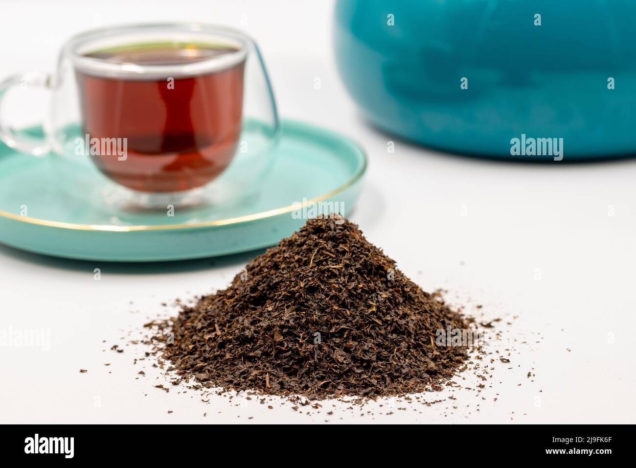 Black tea isolated on a white background. close up Stock Photo - Alamy
