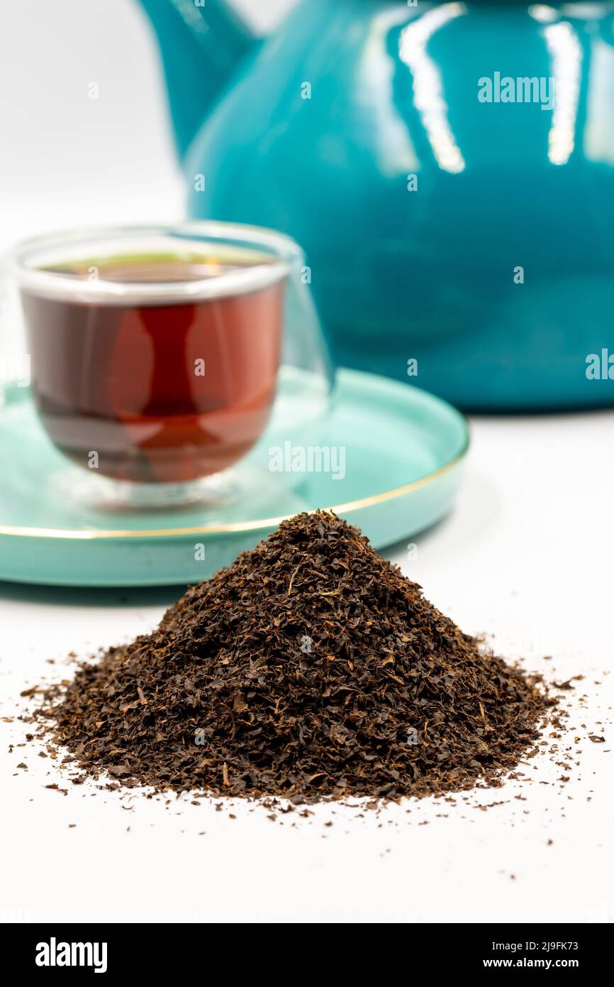 Black tea isolated on a white background. close up Stock Photo - Alamy
