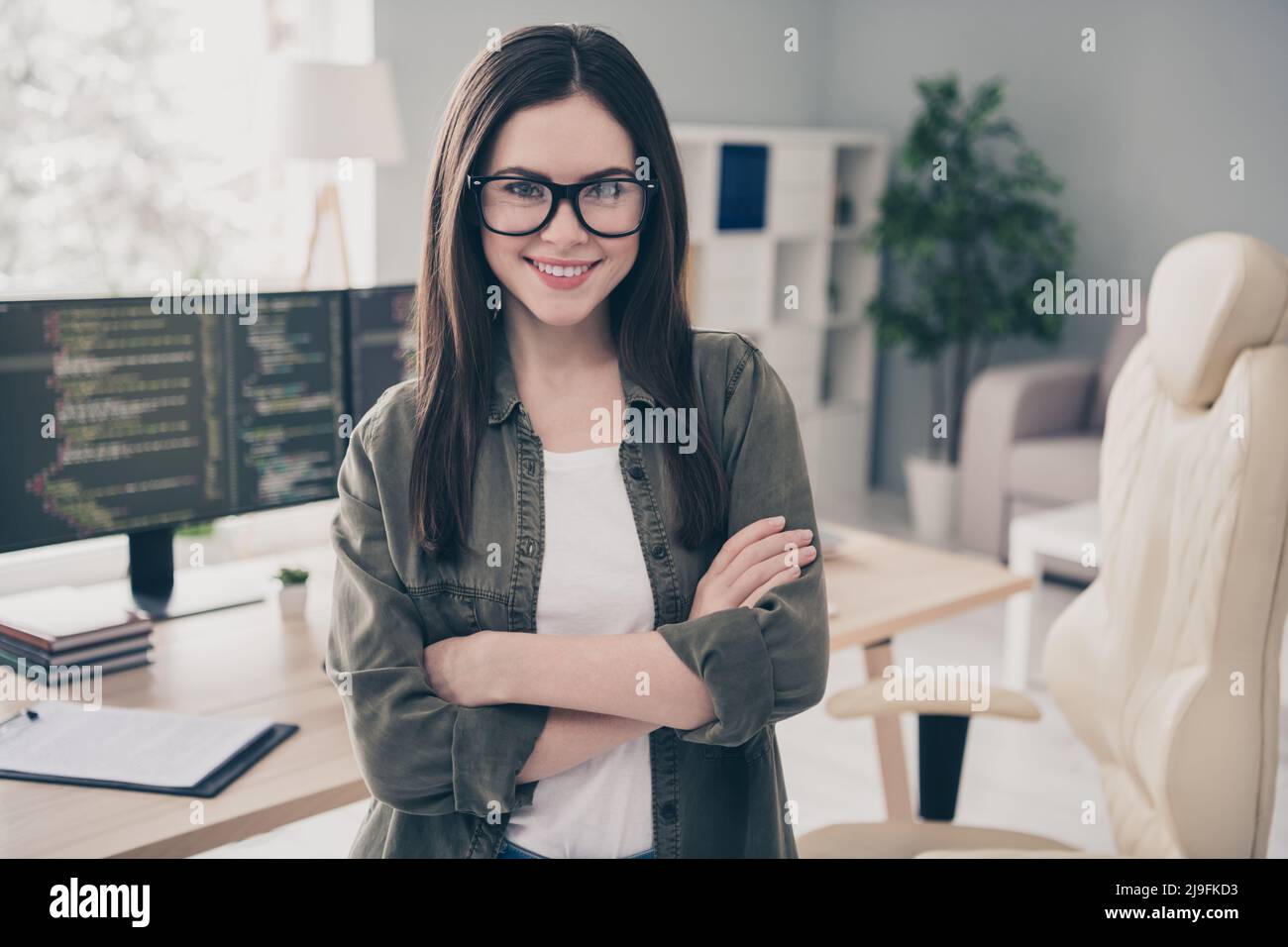 Portrait of attractive cheerful content girl expert developing web ...
