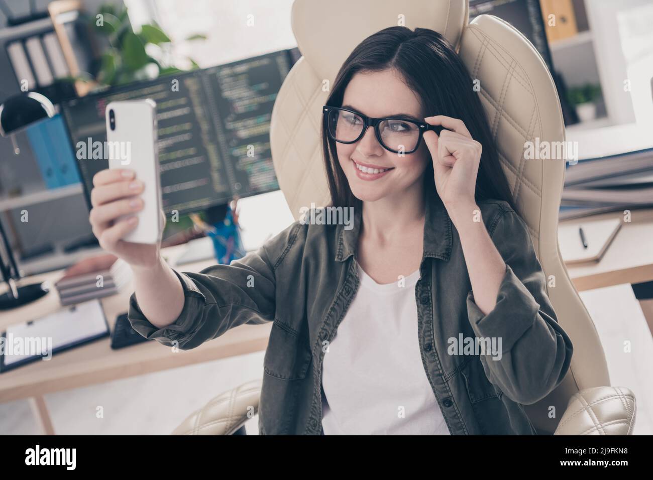 Portrait of attractive cheerful skilled intellectual girl web developer ...