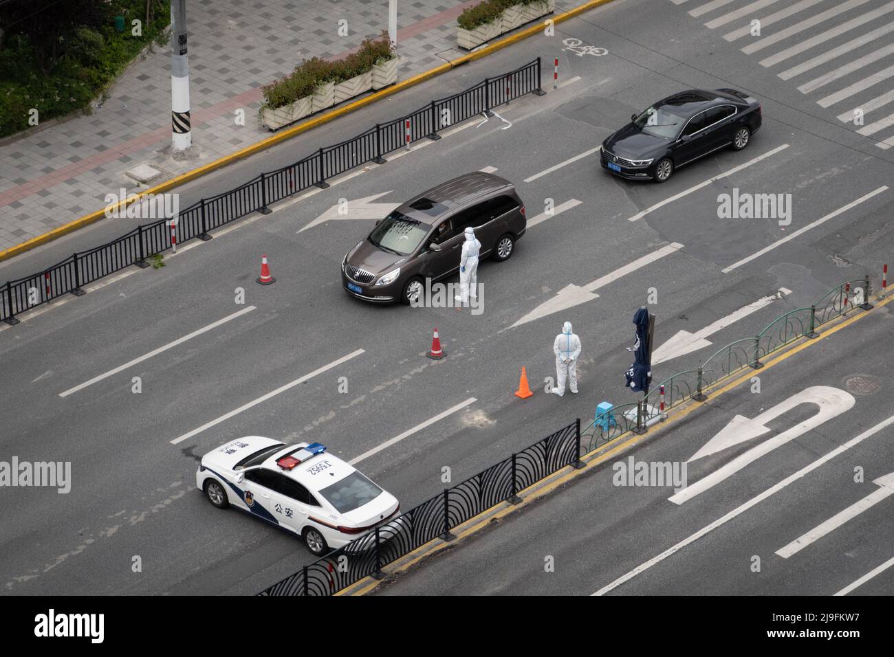 SHANGHAI, CHINA - MAY 23, 2022 - Police check passes, health codes and ...
