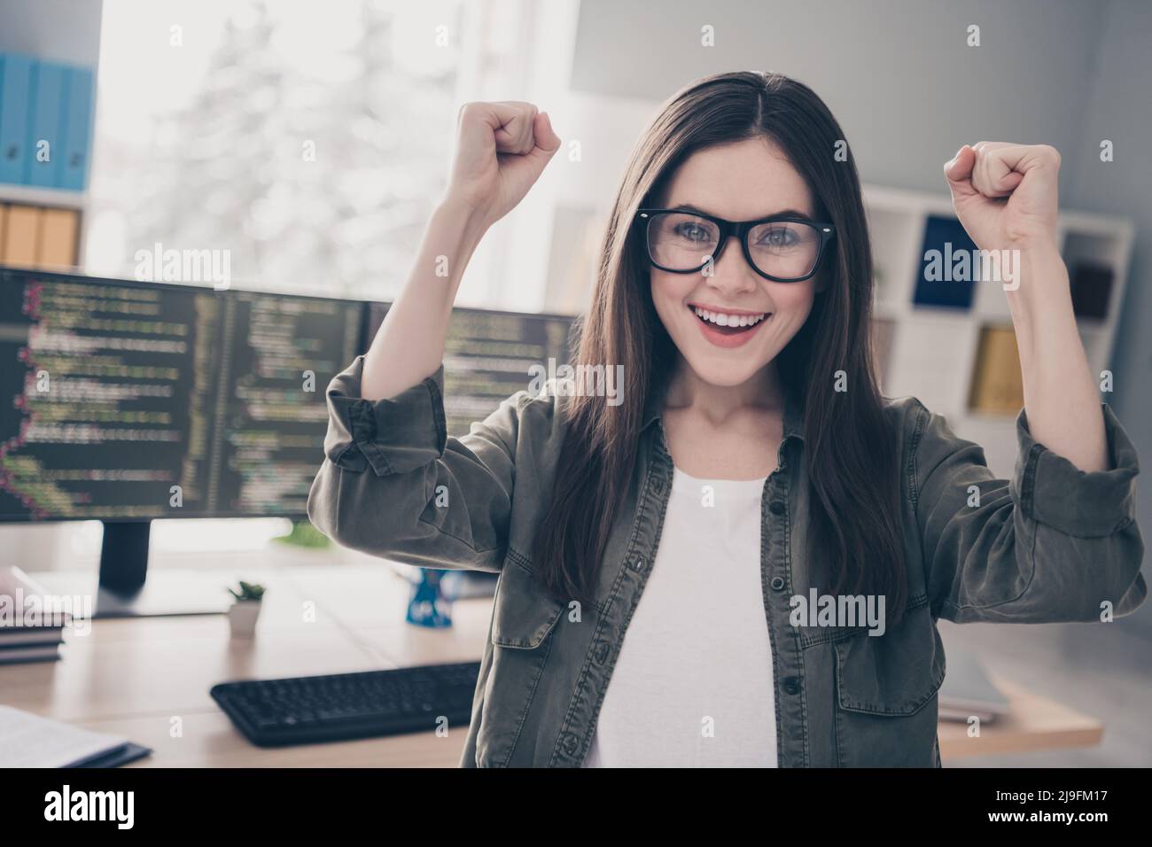 Portrait of beautiful cheerful lucky girl expert rejoicing having fun ...