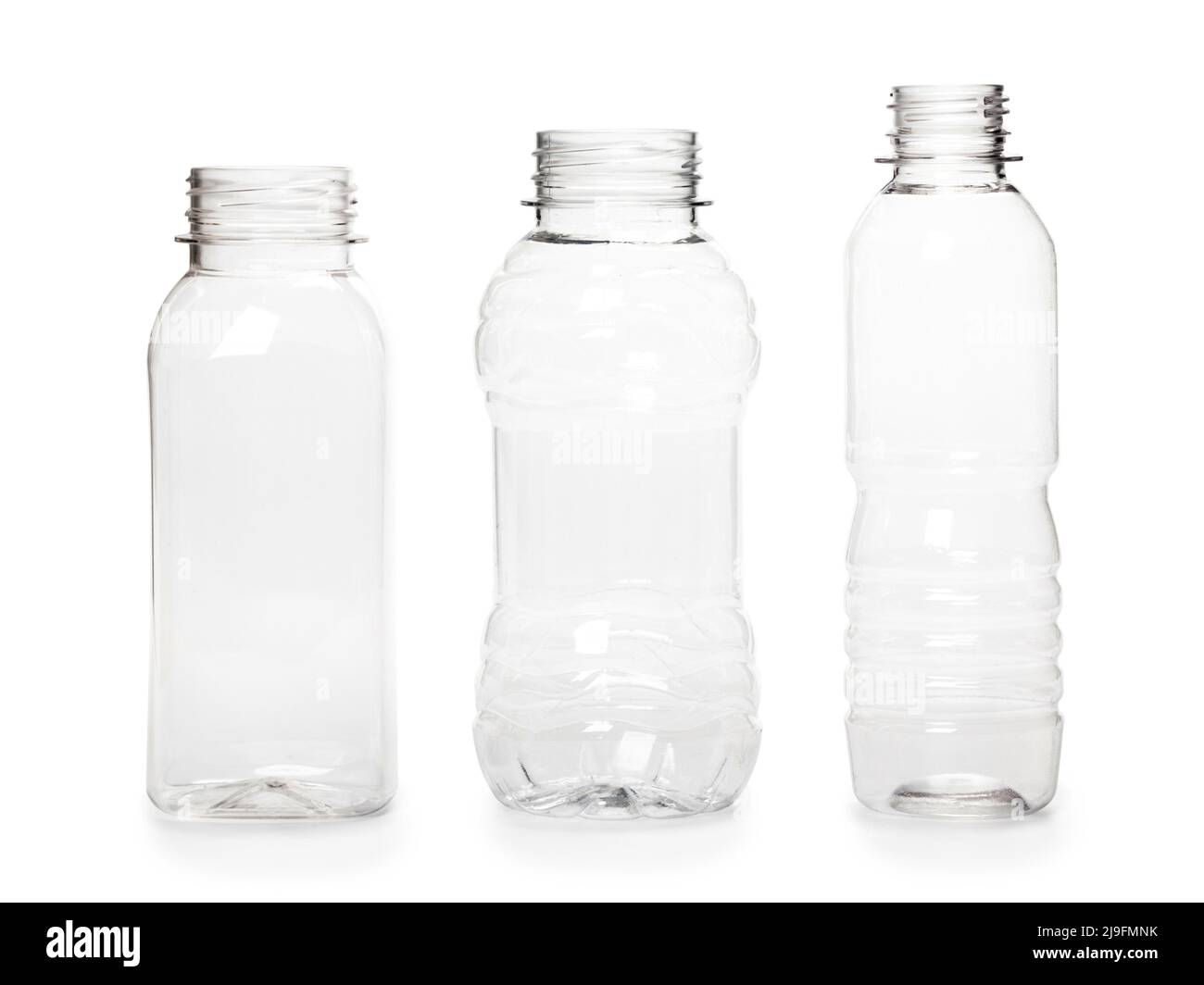 three different empty plastic bottles isolated on white background ...