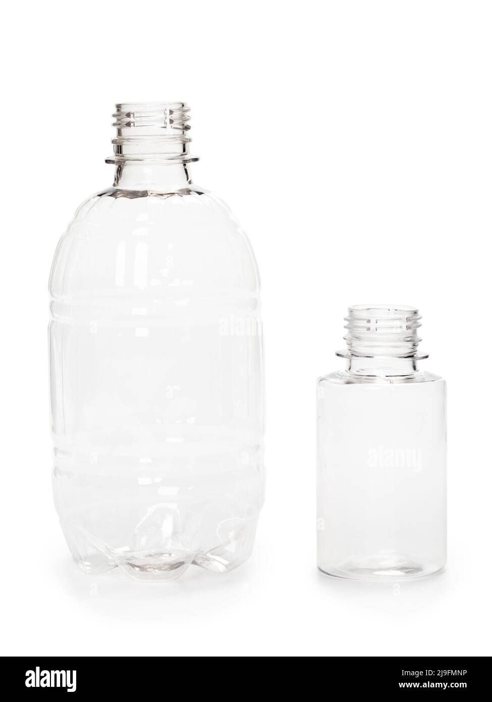 two empty new plastic bottle isolated on white background. production ...