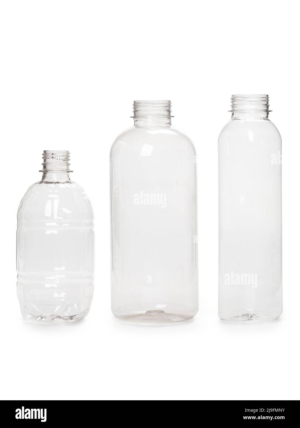 three different empty plastic bottles isolated on white background ...