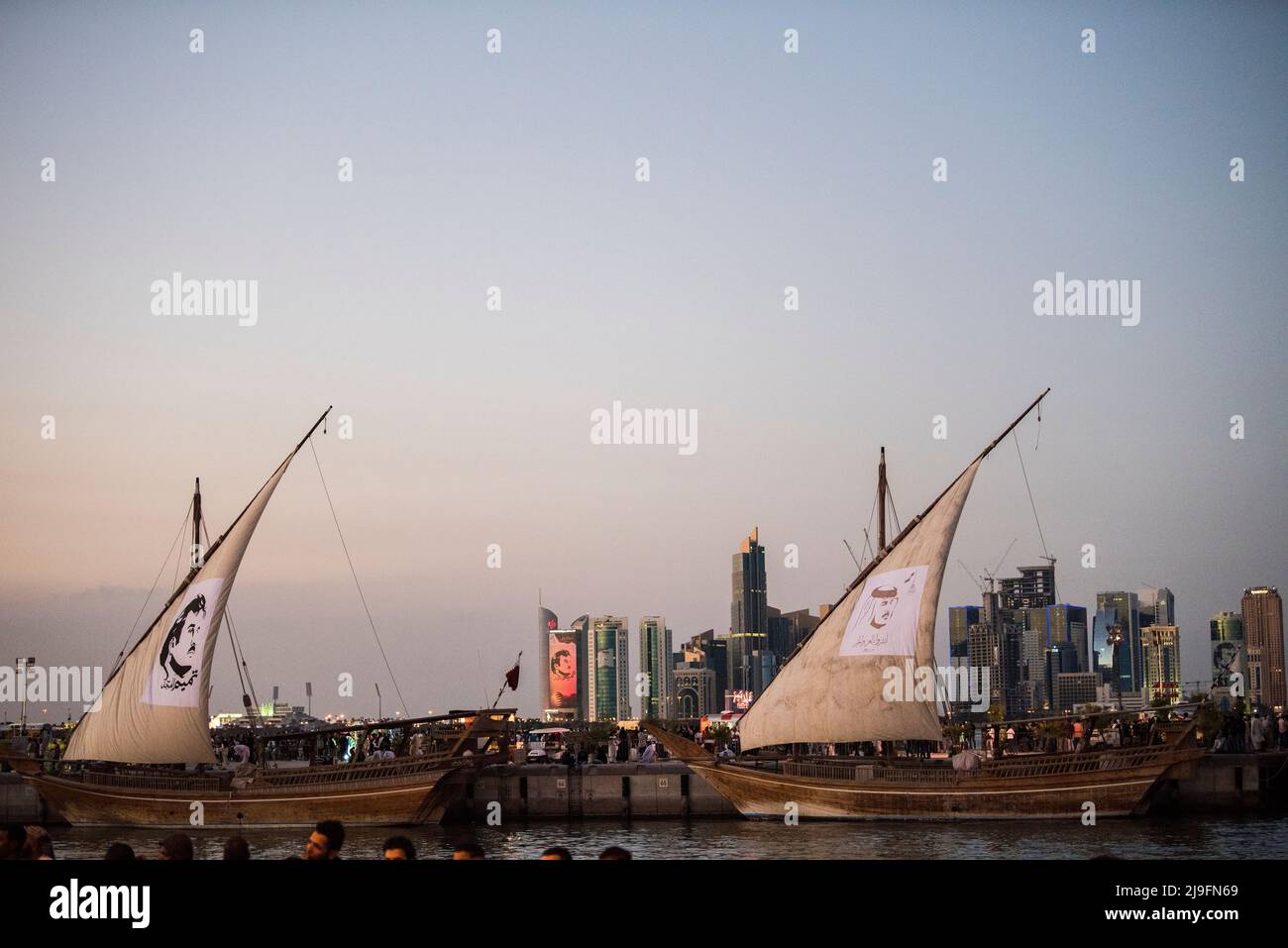 Doha,Qatar- April 24,2022 Traditional boats called Dhows are anchored ...