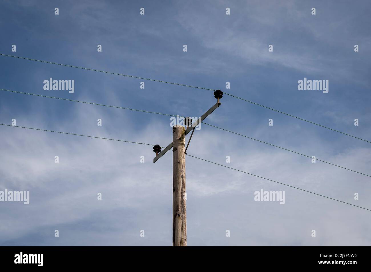 Electric transmission lines wooden poles hi-res stock photography and ...