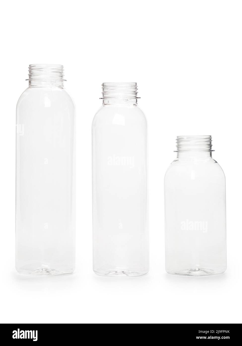 three different empty plastic bottles isolated on white background ...