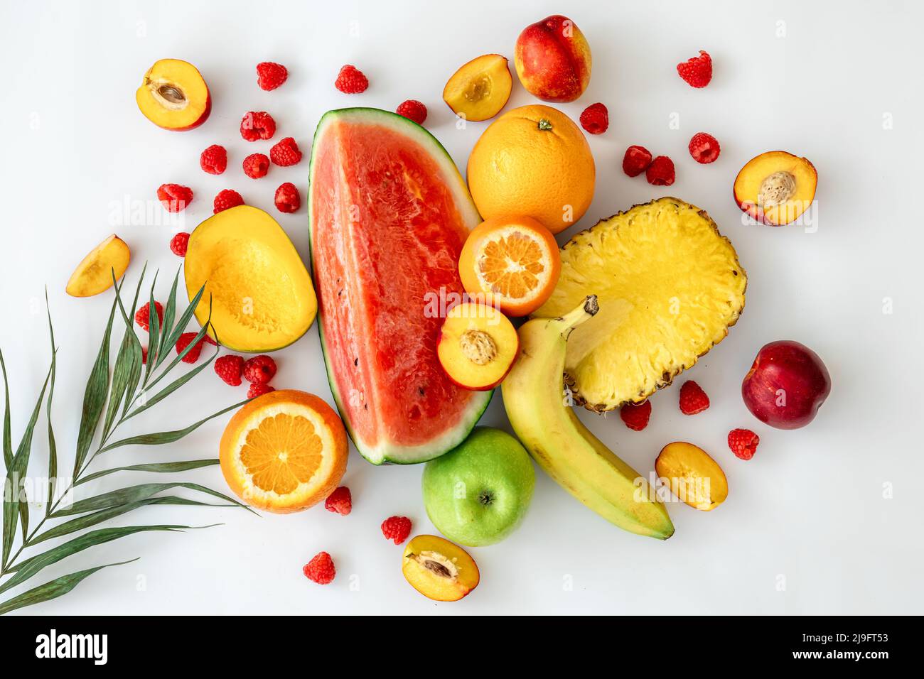 Tropical fruits on a white background top view Stock Photo - Alamy
