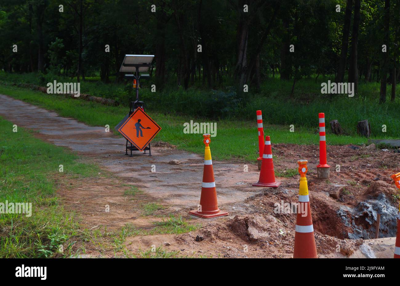 The under-construction sign in the public park Stock Photo - Alamy