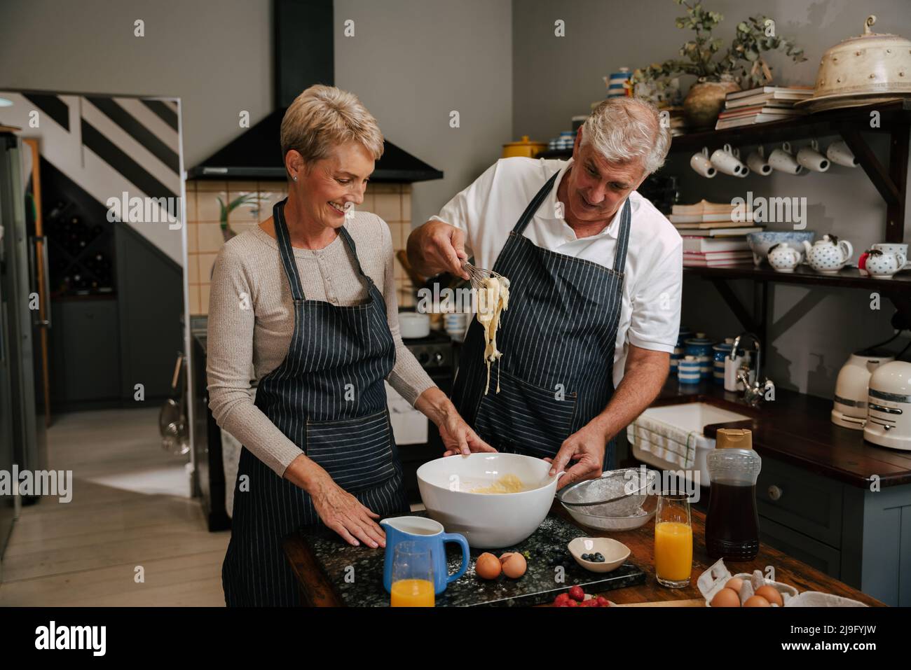 Woman making cakes in kitchen hi-res stock photography and images - Alamy