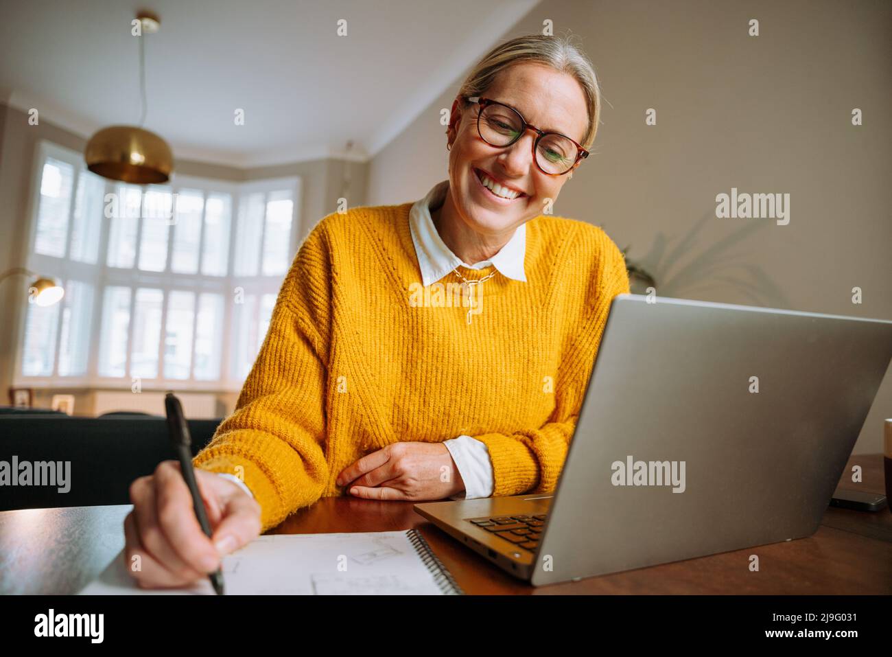 Person working on documents hi-res stock photography and images - Alamy