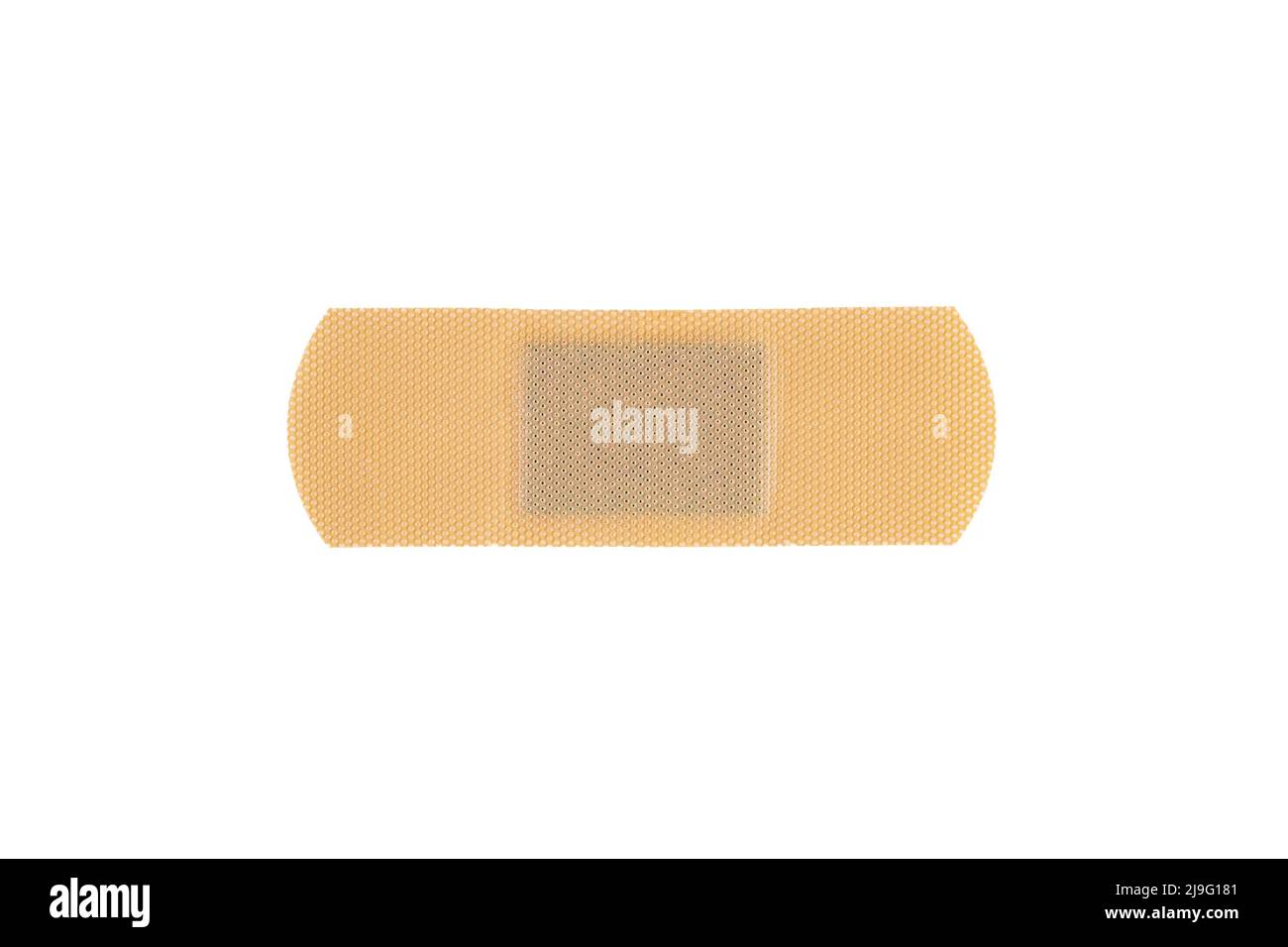 Beige adhesive bandage or medical sticking plaster for first aid ...