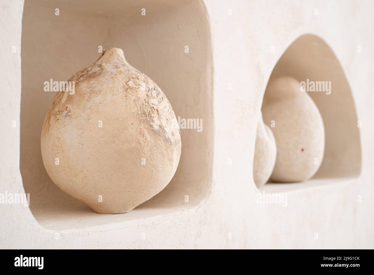 Ceramic vases in a minimalist style Stock Photo - Alamy