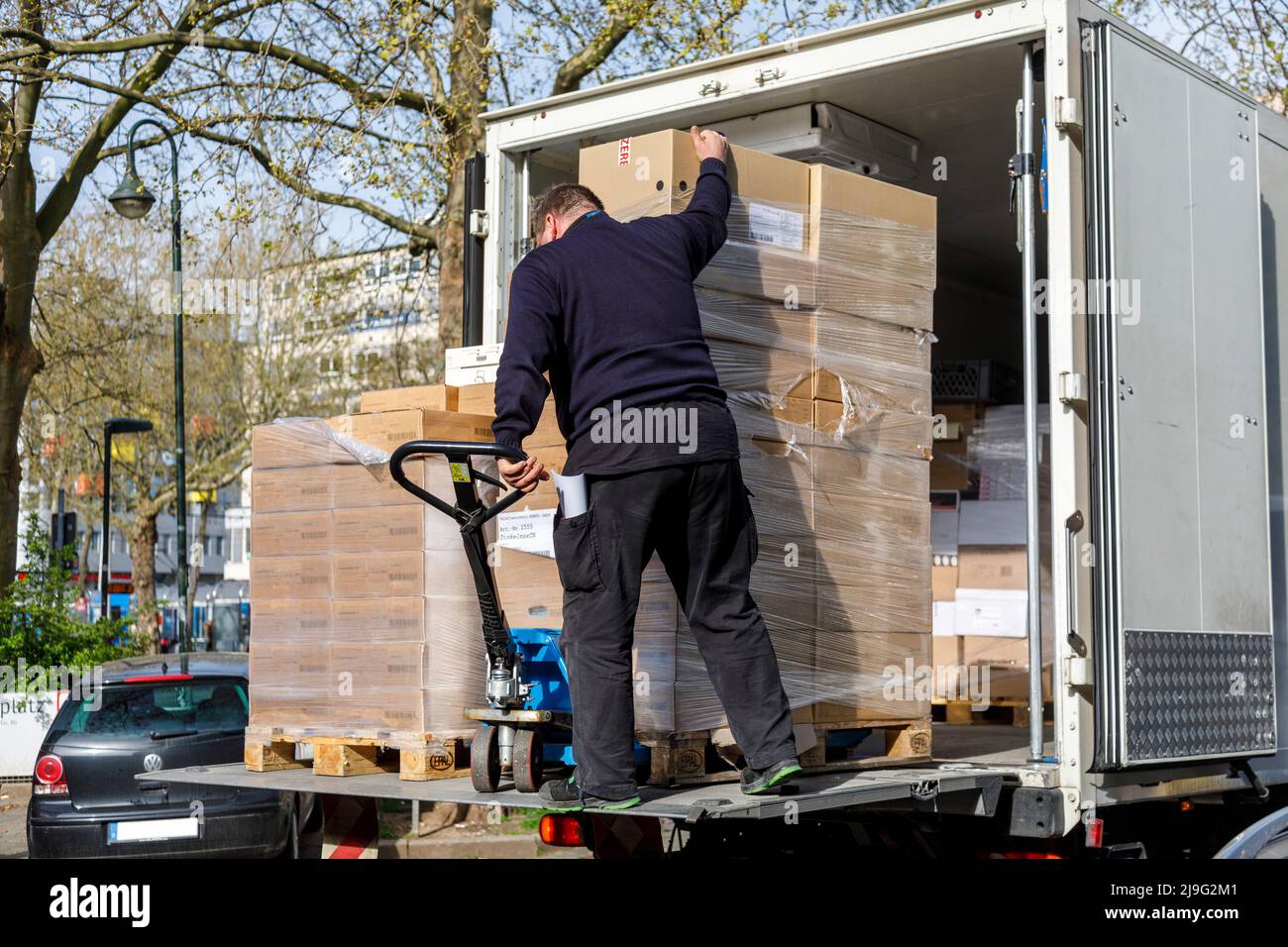 Local delivery traffic, unloading of frozen goods at Dusseldorf main ...