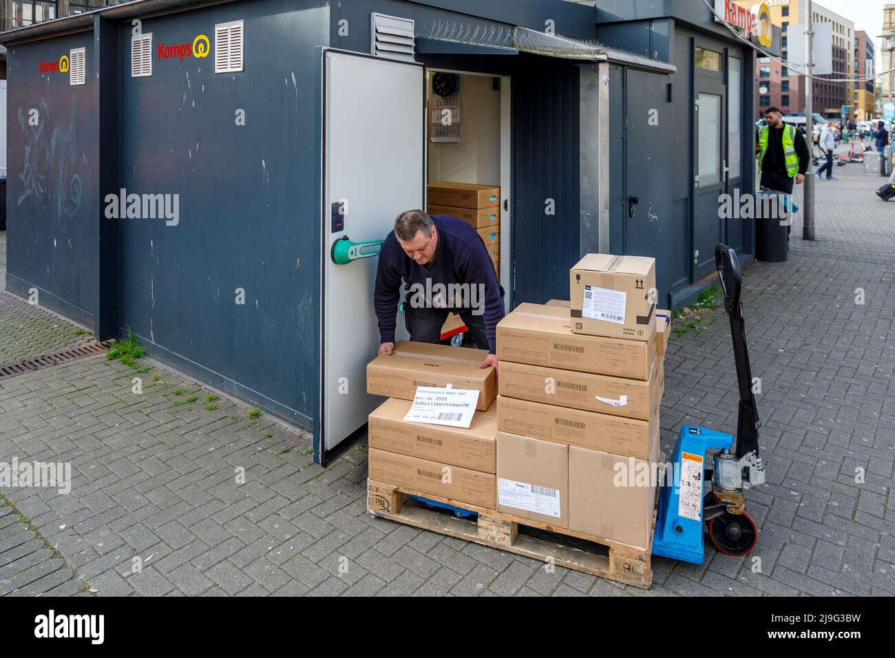 Delivery of groceries at Dusseldorf main station by a forwarding agent ...