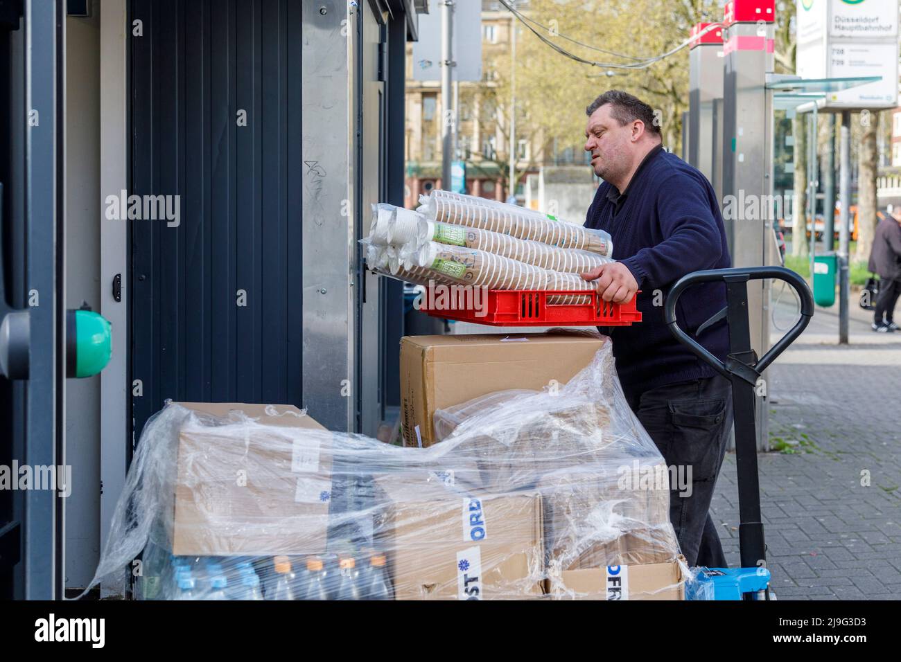 Man truck loading food products hi-res stock photography and images - Alamy