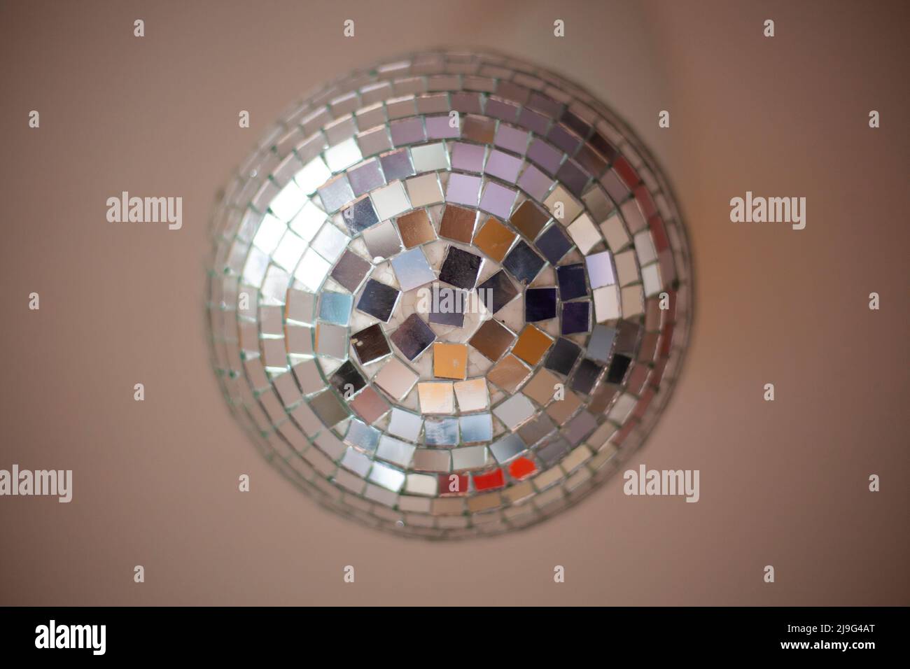 Diisco ball in daylight. Decoration for interior. Ball hangs from ...