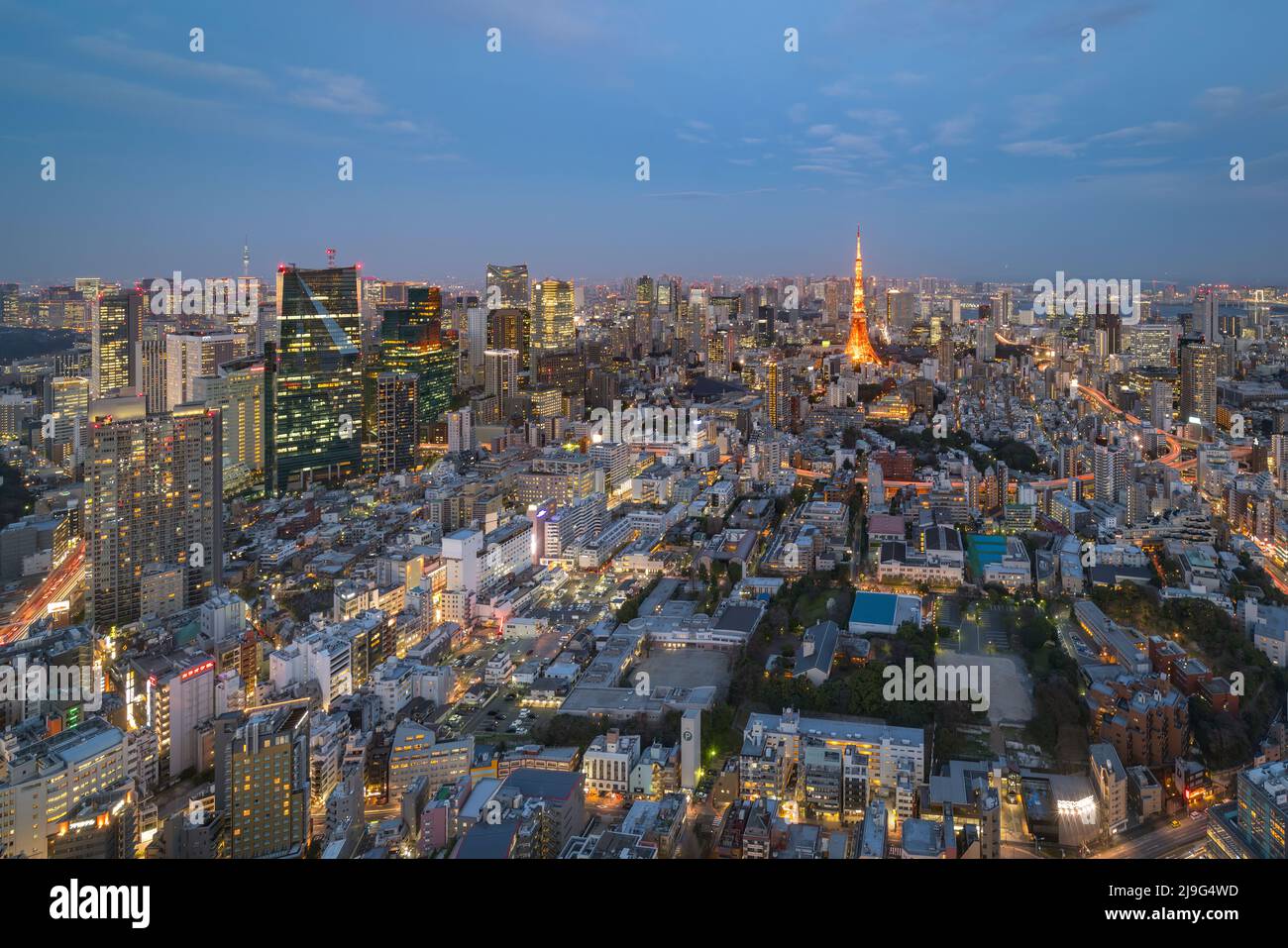The Tokyo Tower and the streets at dusk Stock Photo - Alamy