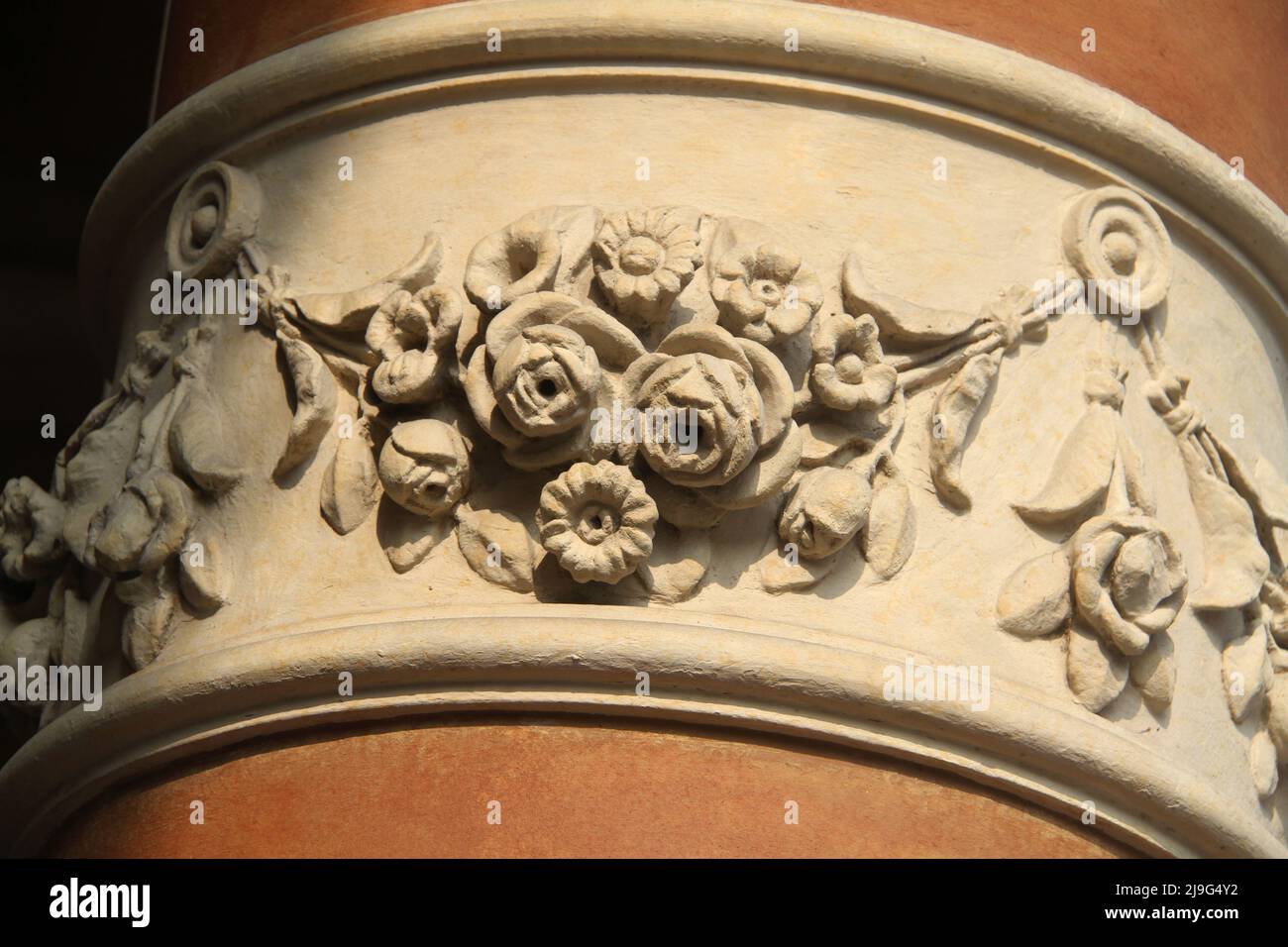 Bologna, Italy. Beautiful old-fashioned stucco design applied around a ...