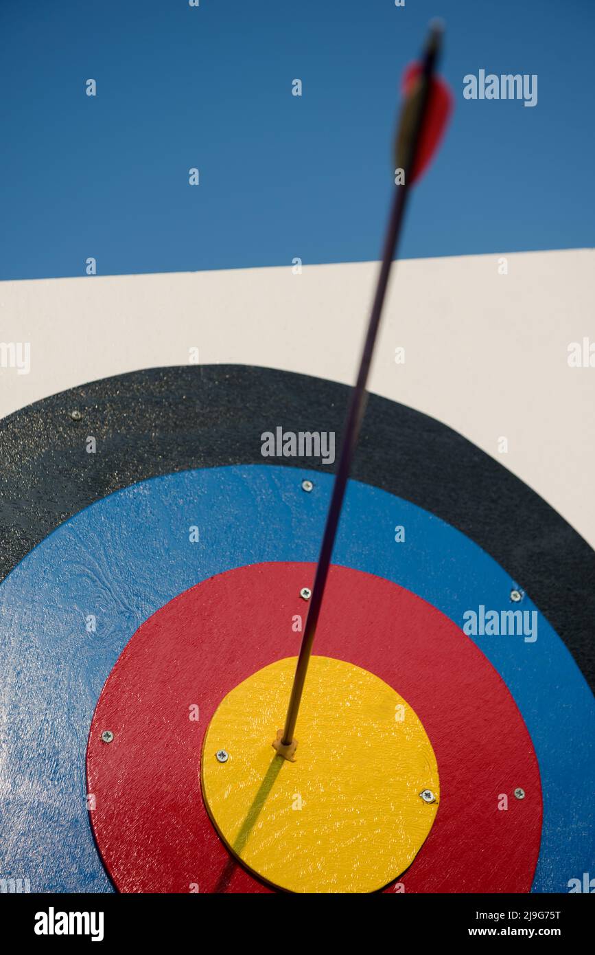 Arrow in the center of target for archery, closeup Stock Photo - Alamy