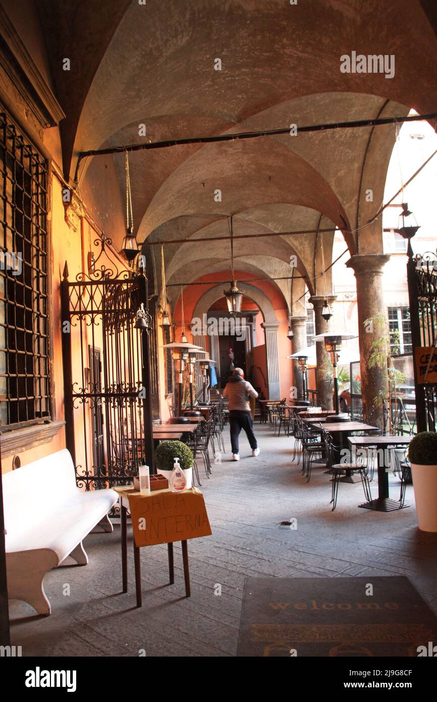 Bologna, Italy. Portico used as the outdoor seating area of a ...