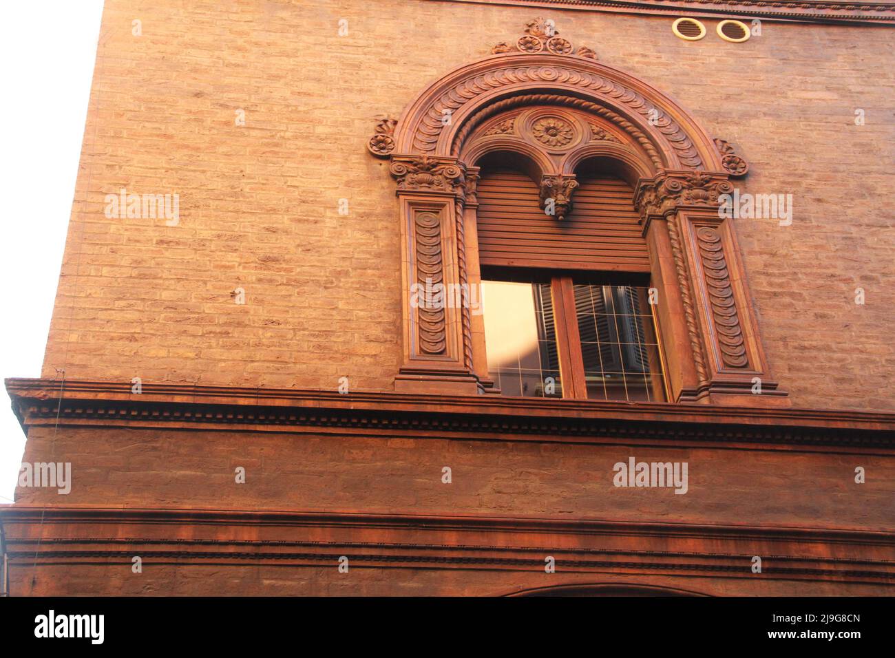 Bologna, Italy. Beautifully decorated moulding of a window in the ...