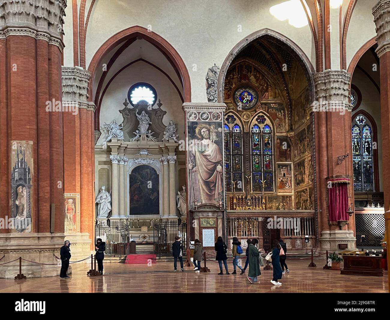 Bologna, Italy. People visiting the famous Church of Saint Petronius ...