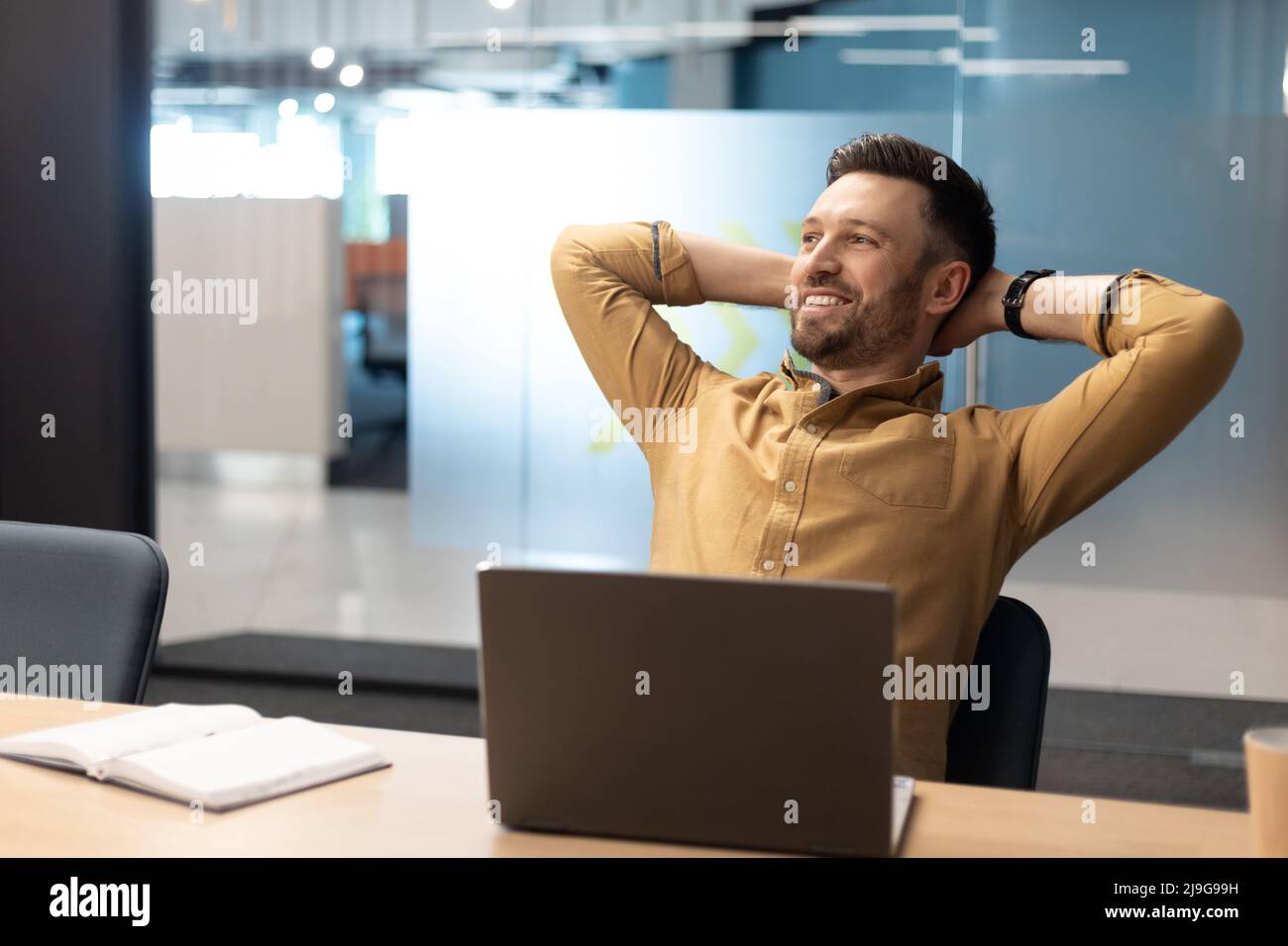 Relaxed business man in workplace hi-res stock photography and images ...