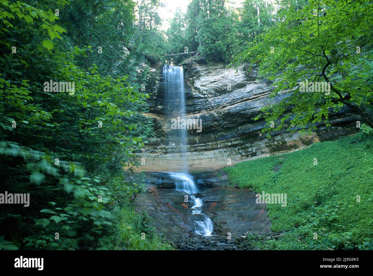 Munising Falls of Munising, Michigan in mid summer is created my ...