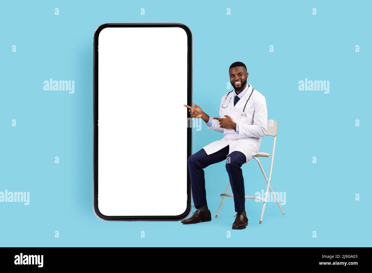 Doctor sitting on chair hi-res stock photography and images - Alamy