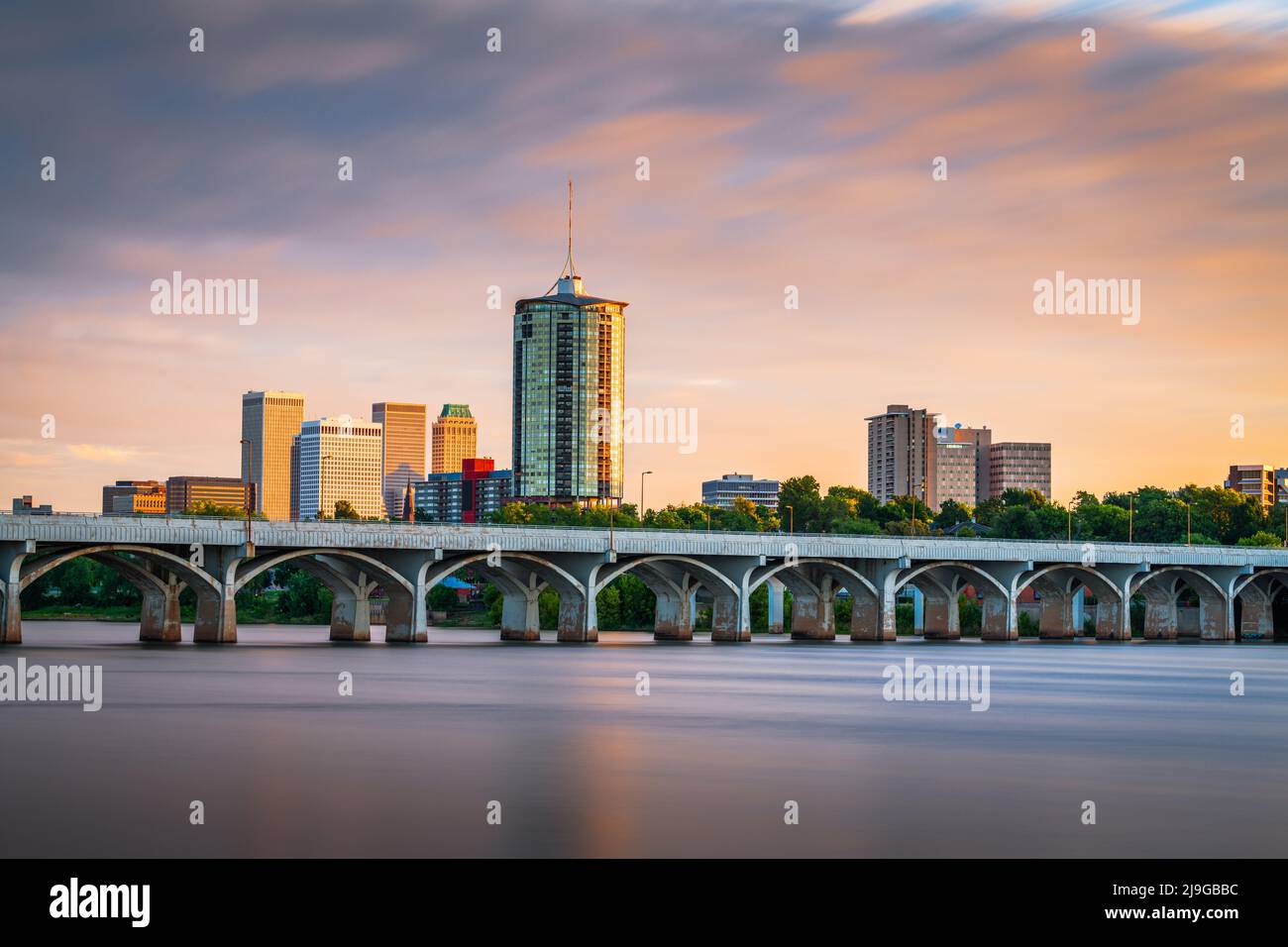 Tulsa, Oklahoma, USA downtown skyline on the Arkansas River at dusk ...