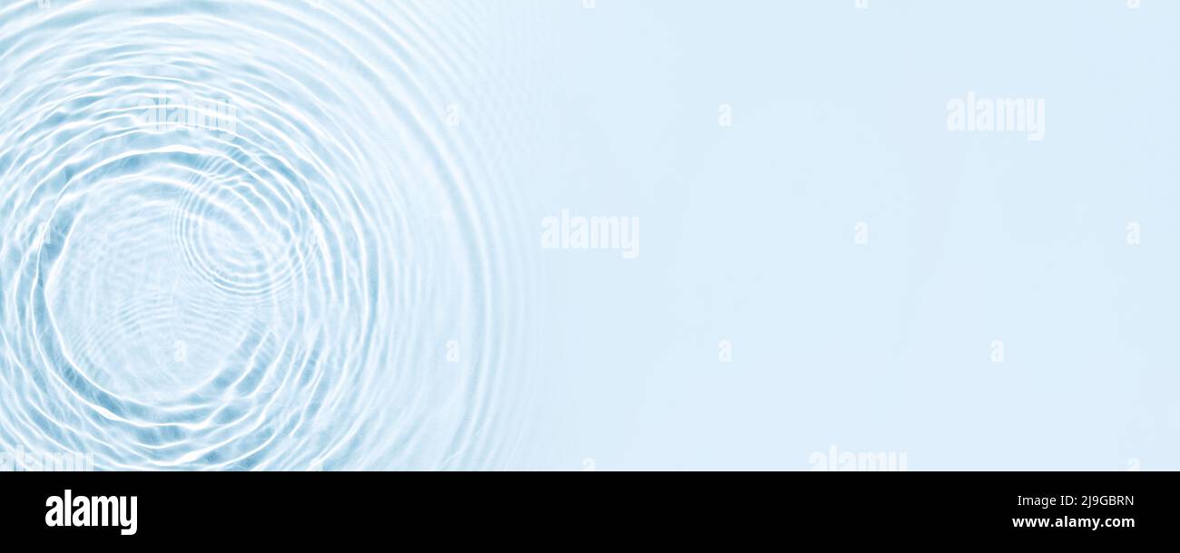 The texture of water on a blue background Stock Photo - Alamy