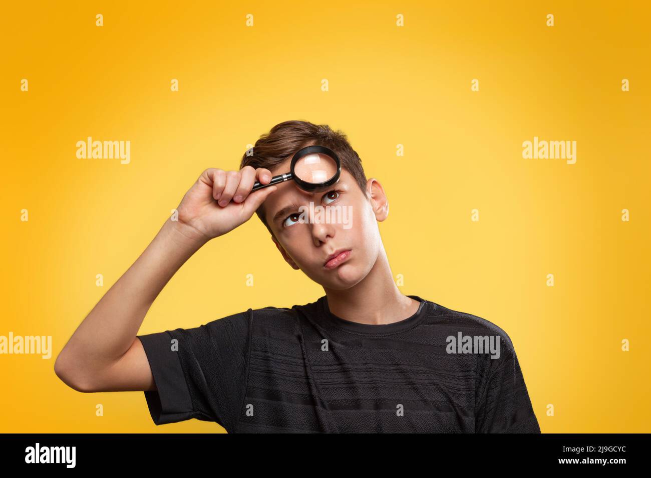 The concept of search information. A teenager in a black t-shirt, with ...