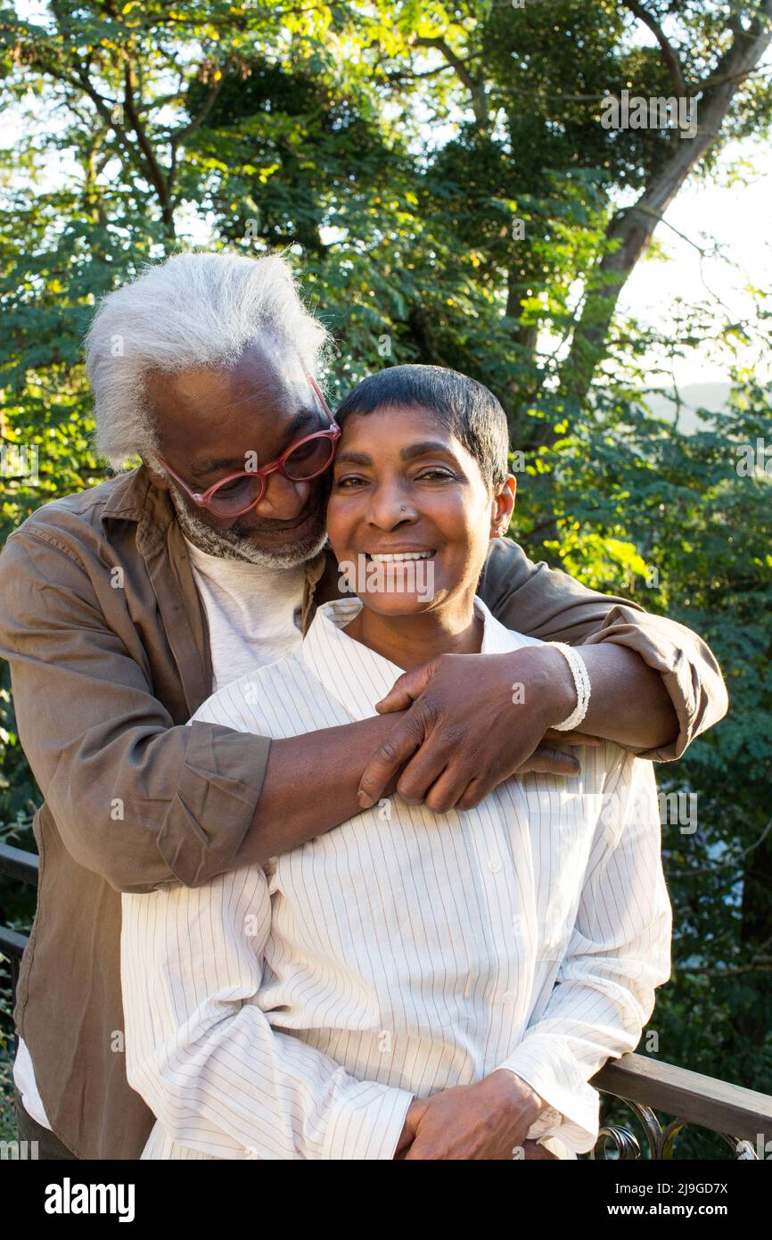 Couple embracing each other in balcony Stock Photo - Alamy