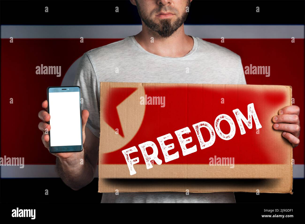 Concept of freedoms and human rights. A man with a cardboard and a ...