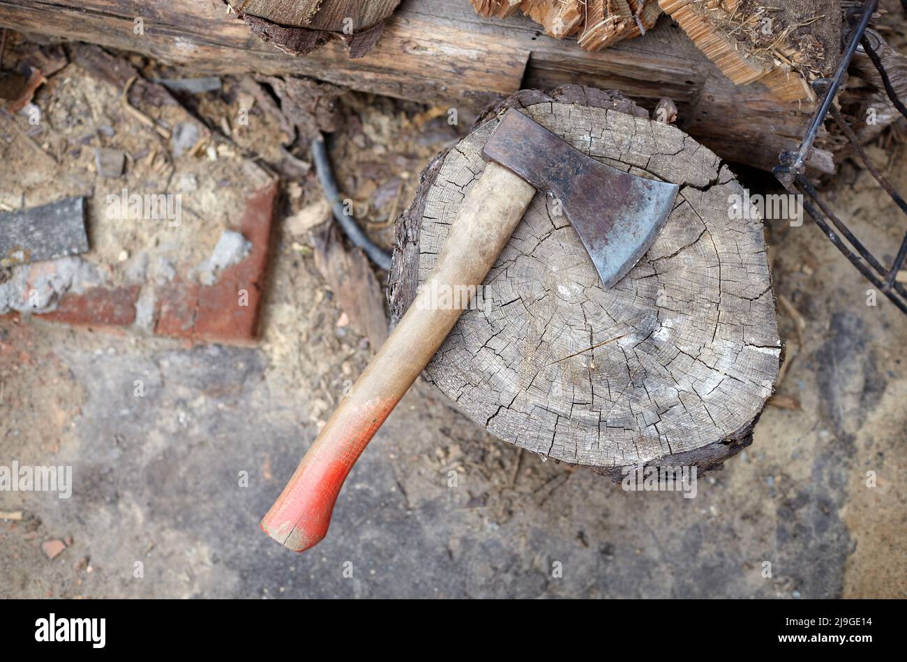 Ax in the stump. Axe for cutting wood. Preparation of firewood for the ...