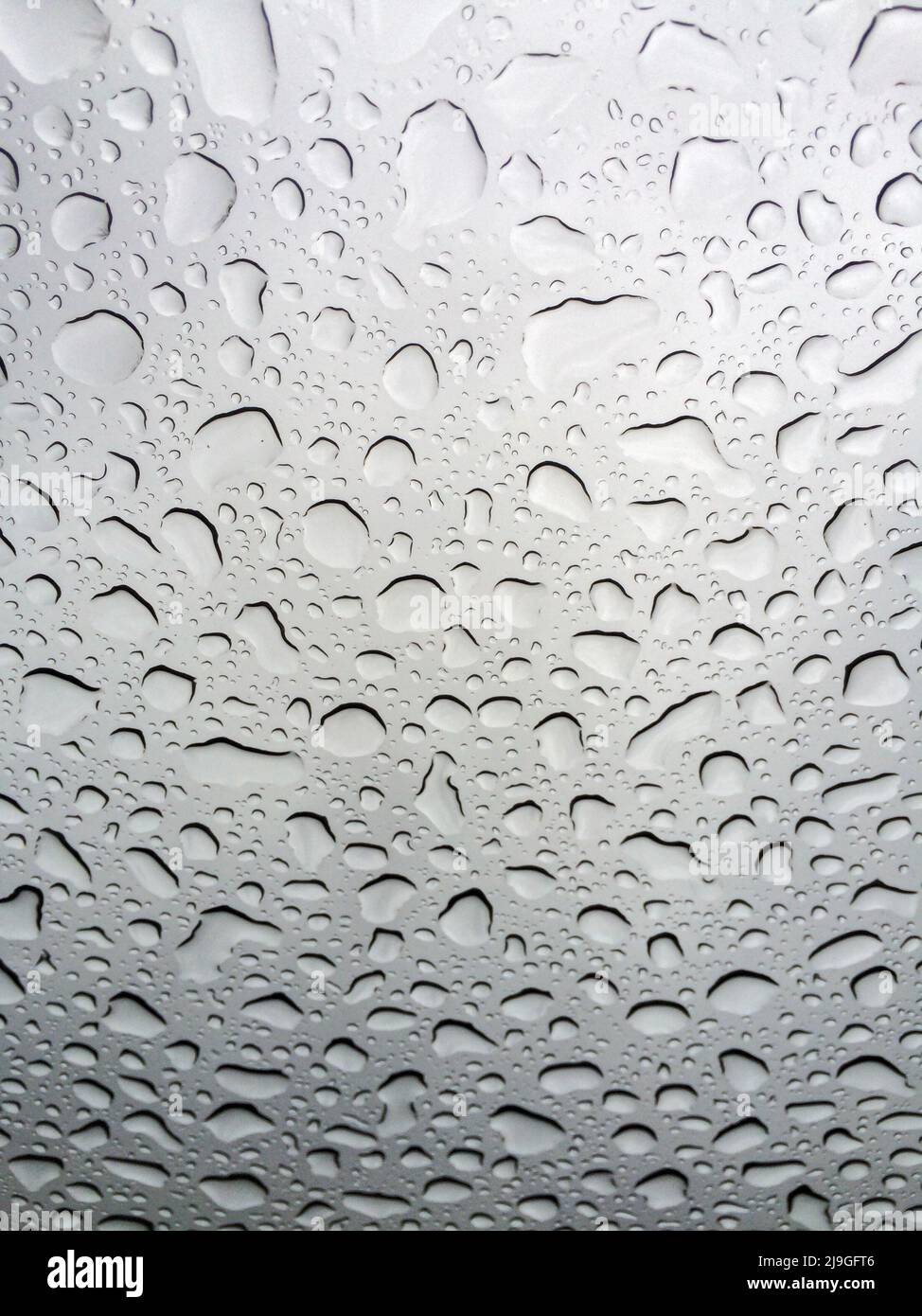 Abstract texture of water drops on a glass Stock Photo - Alamy