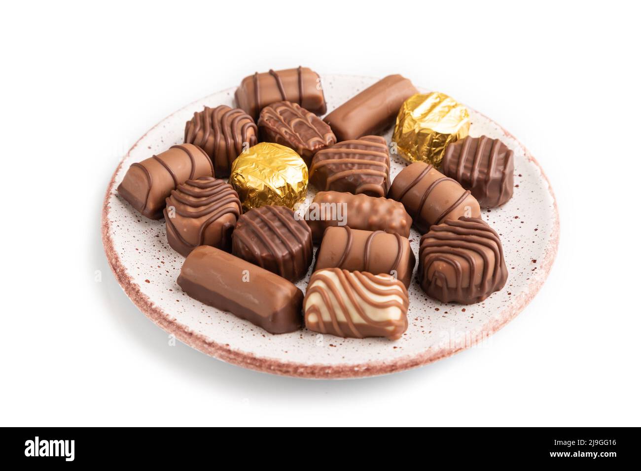 Chocolate candies isolated on white background. side view, flat lay ...