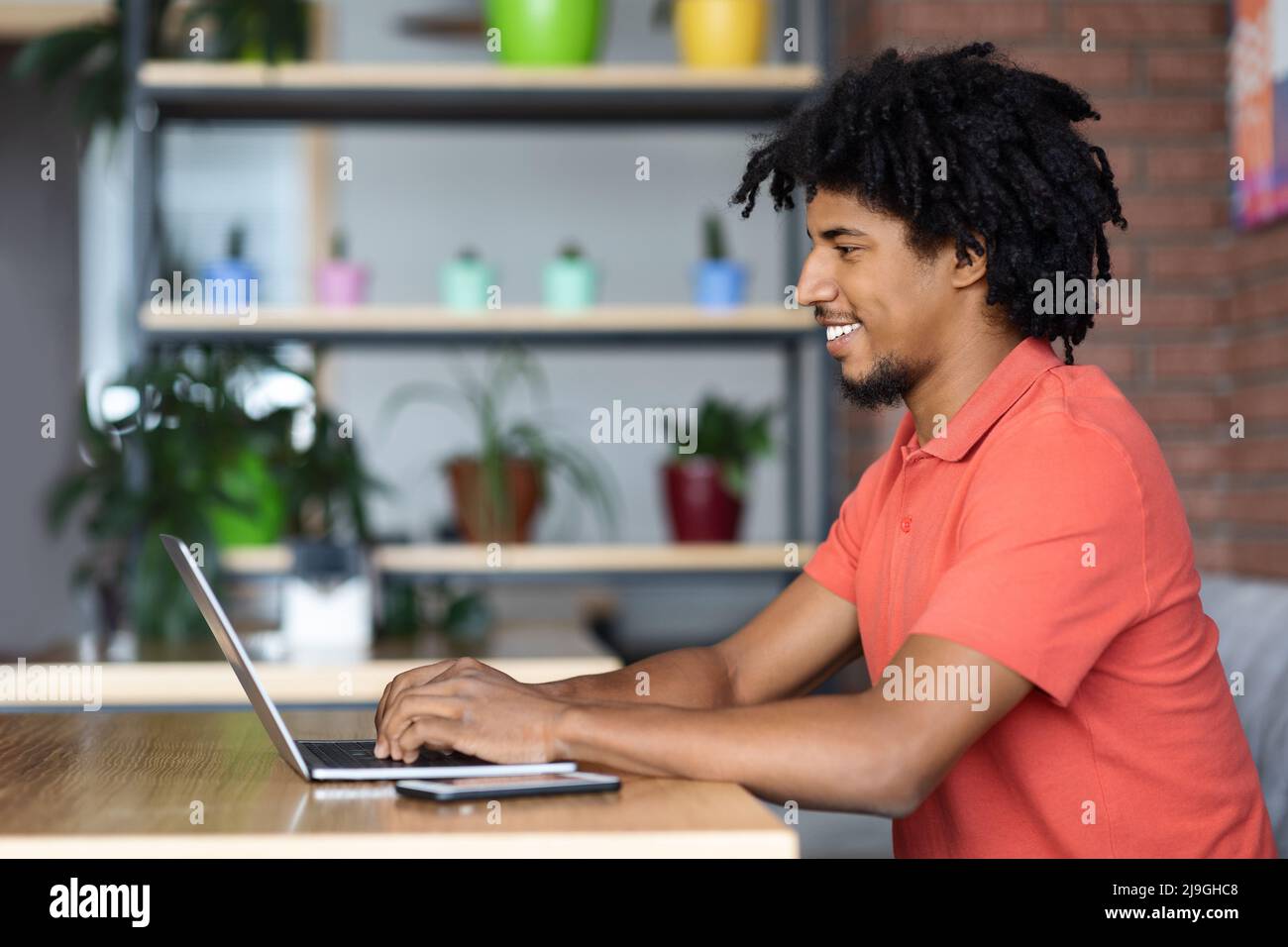 Happy male cafe hi-res stock photography and images - Alamy